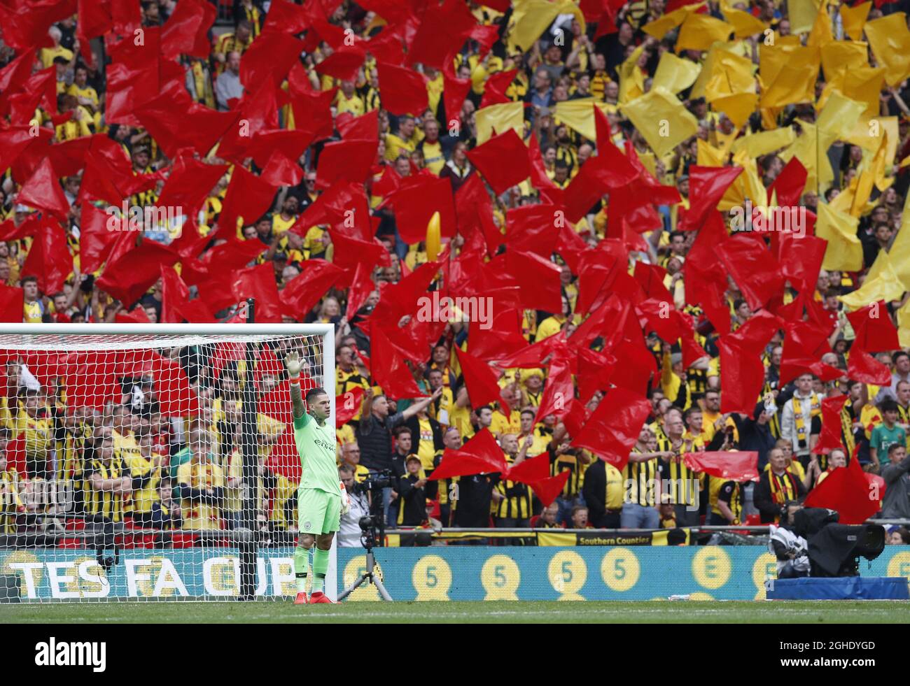 Watford fans defiantly wave their flags during the FA Cup Final match ...