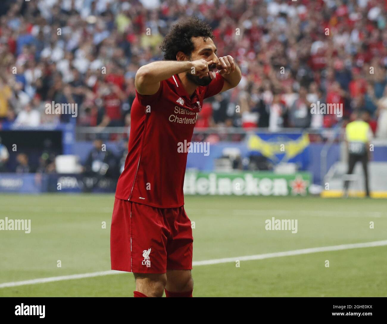 Mohamed Salah of Liverpool celebrates scoring the first goal during the ...