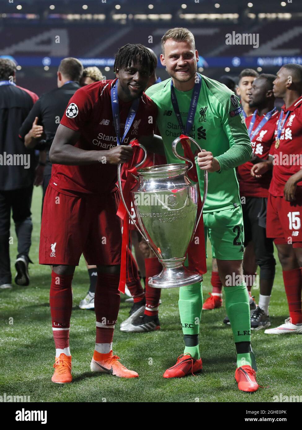 Divock Origi of Liverpool and Simon Mignolet of Liverpool with the cup ...