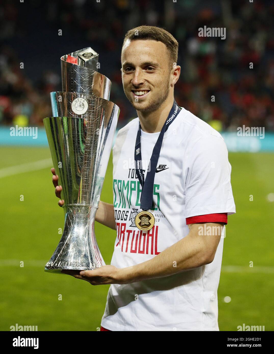 Portugals Diogo Jota With The Trophy During The Uefa Nations League Match At The Dragon Stadium