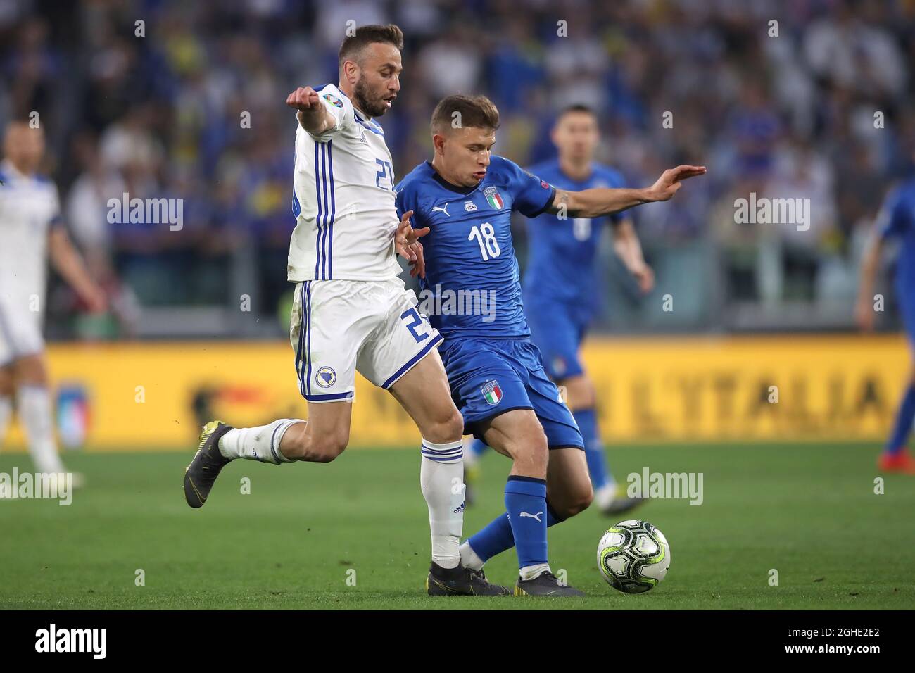 Elvis Saric of Bosnia and Nicolo Barella of Italy during the UEFA ...