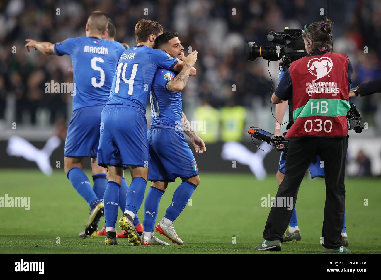Lorenzo Insigne of Italy celebrates with team mates after scoring to ...