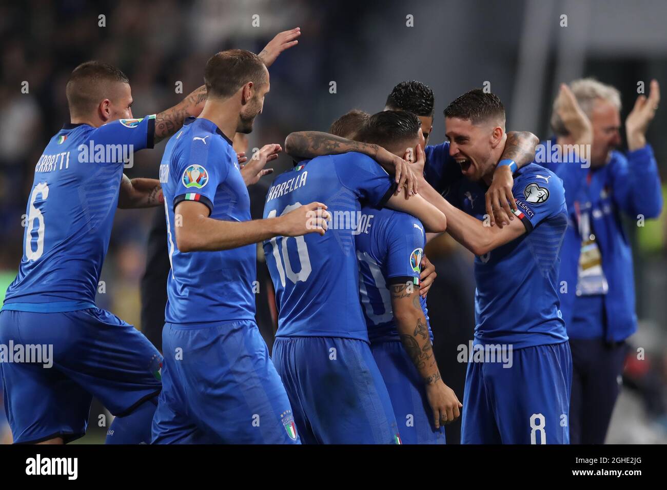 Lorenzo Insigne of Italy celebrates with team mates after scoring to ...