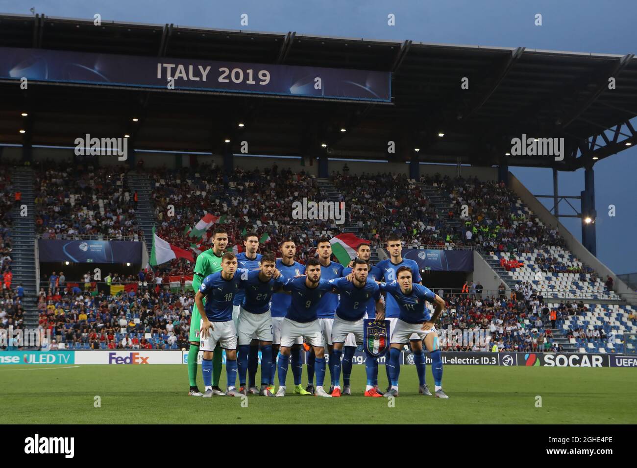 The Italy starting eleven line up for a team photo before kick off ...