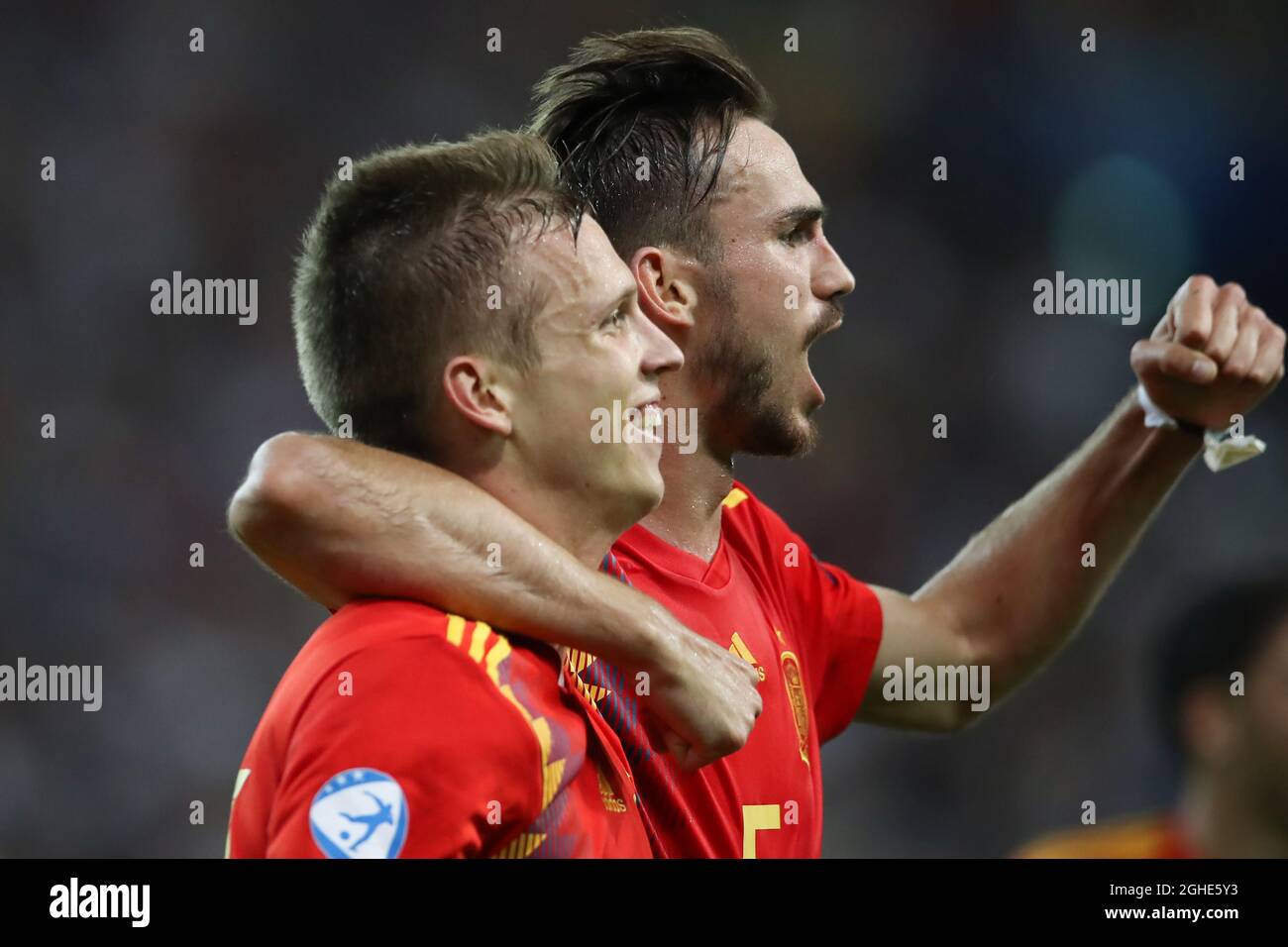 Dani Olmo celebrates with tema mate Fabian Ruiz of Spain after scoring ...