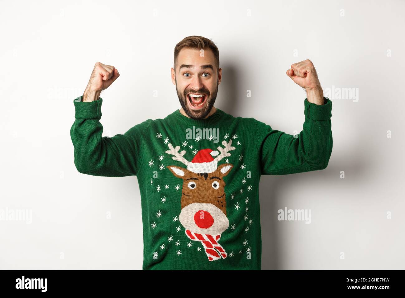 New Year, holidays and celebration. Relieved and excited man in ...