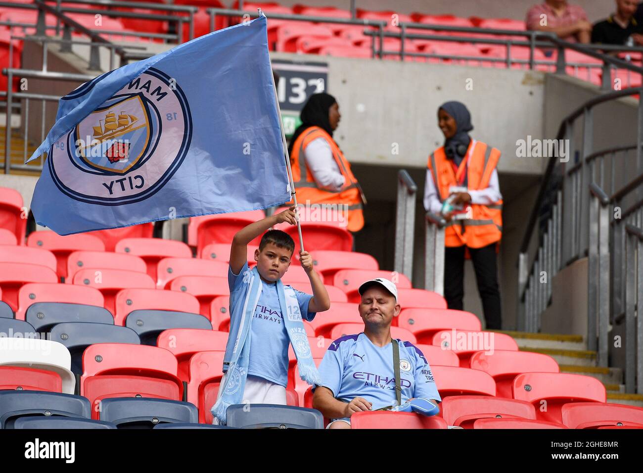 A young Manchester City fan waves a flag ahead of the The FA Community ...