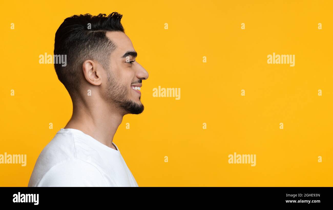Handsome smiling man face profile hi-res stock photography and images ...