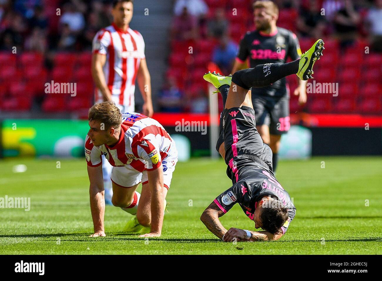 Liam Lindsay of Stoke City challenges Ben White of Leeds United during ...