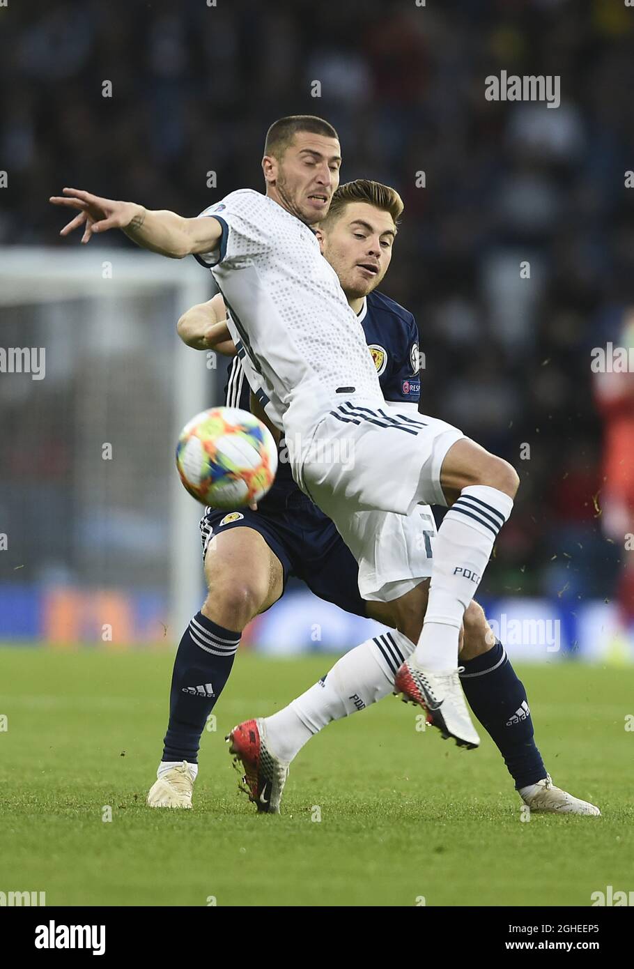 James Forrest of Scotland and Mario Fernandes of Russia during the ...