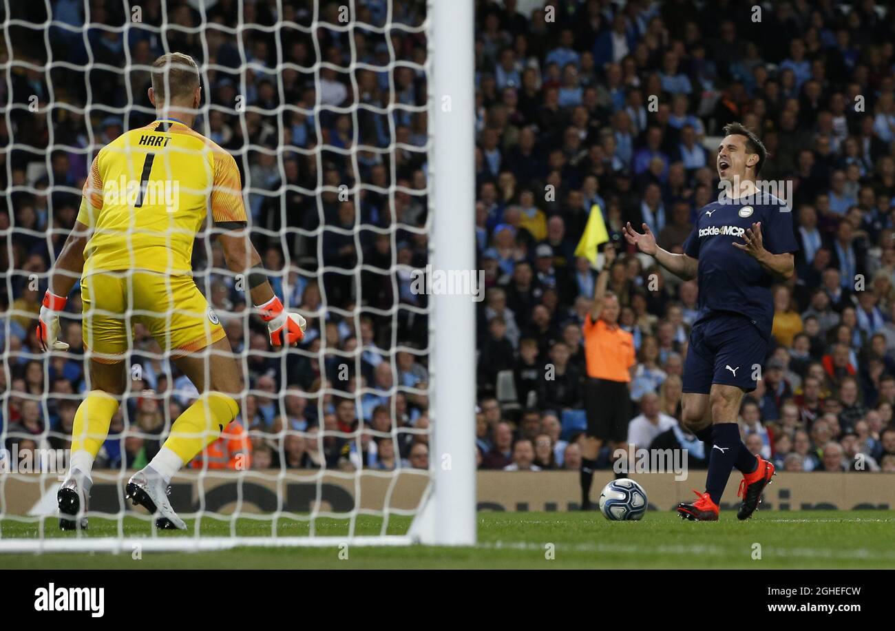 Gary Neville reacts as he is ruled offside during the Vincent Kompany ...