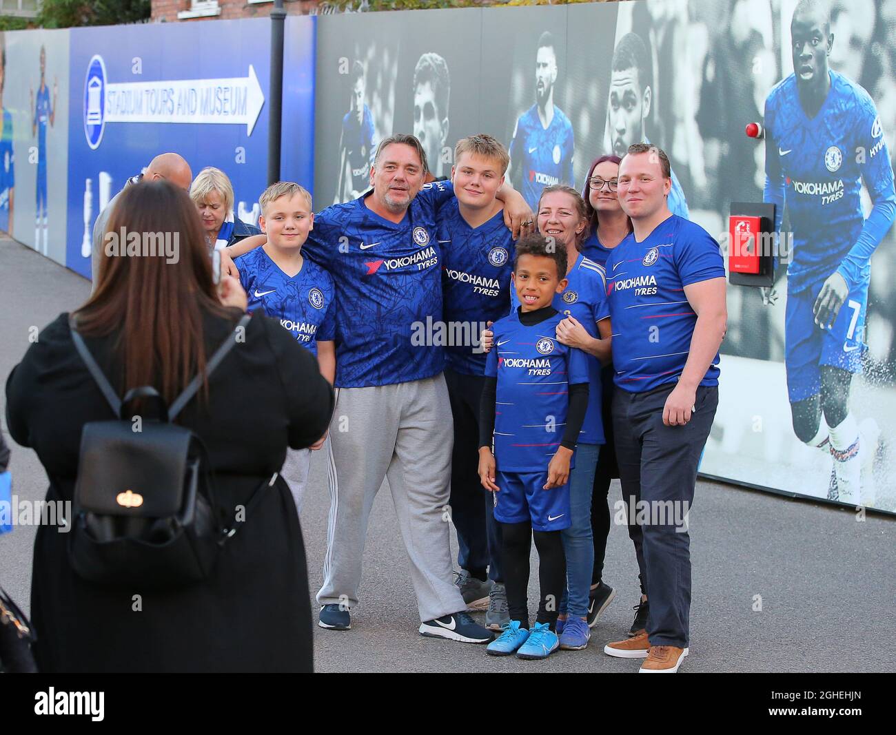 Chelsea fans pose for a photo ahead of the UEFA Champions League match ...