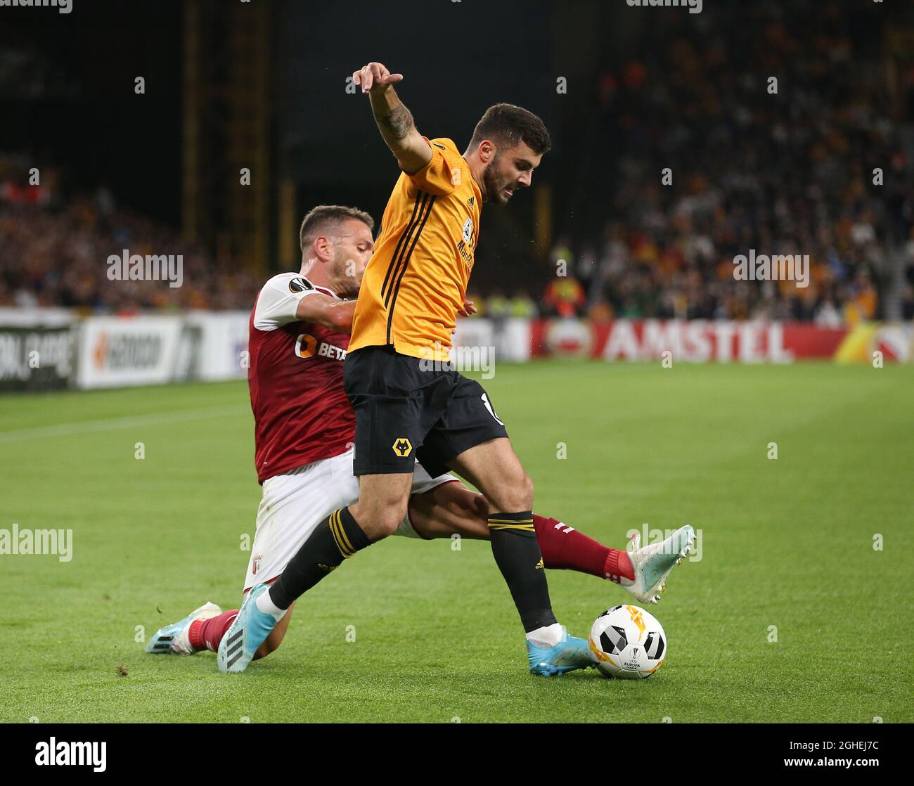 Nuno Sequeria of Sporting Braga tackles Patrick Cutrone of ...