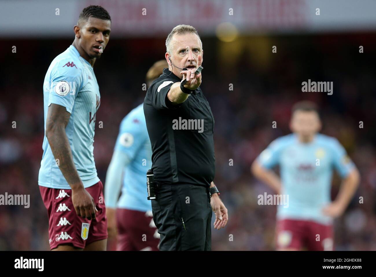 Referee Jonathan Moss (c) during the Premier League match at the ...