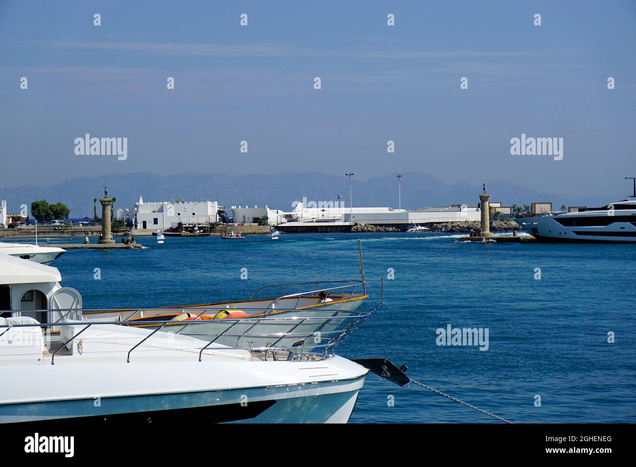 Old mandraki Harbor in Rhodes on Rhodes Island Stock Photo - Alamy