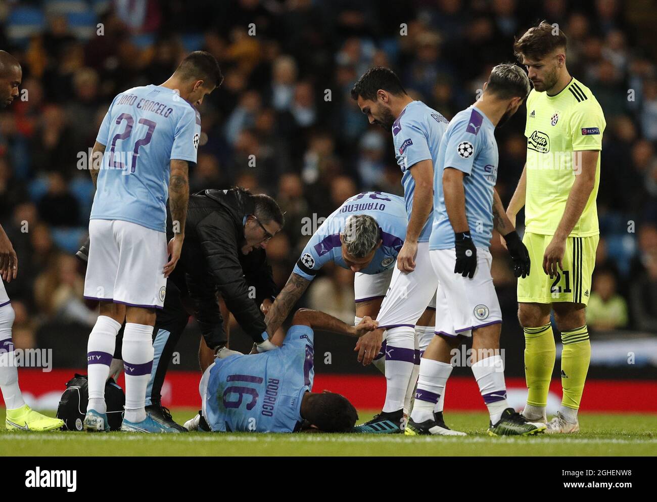 Rodrigo of Manchester City lies injured during the UEFA Champions ...