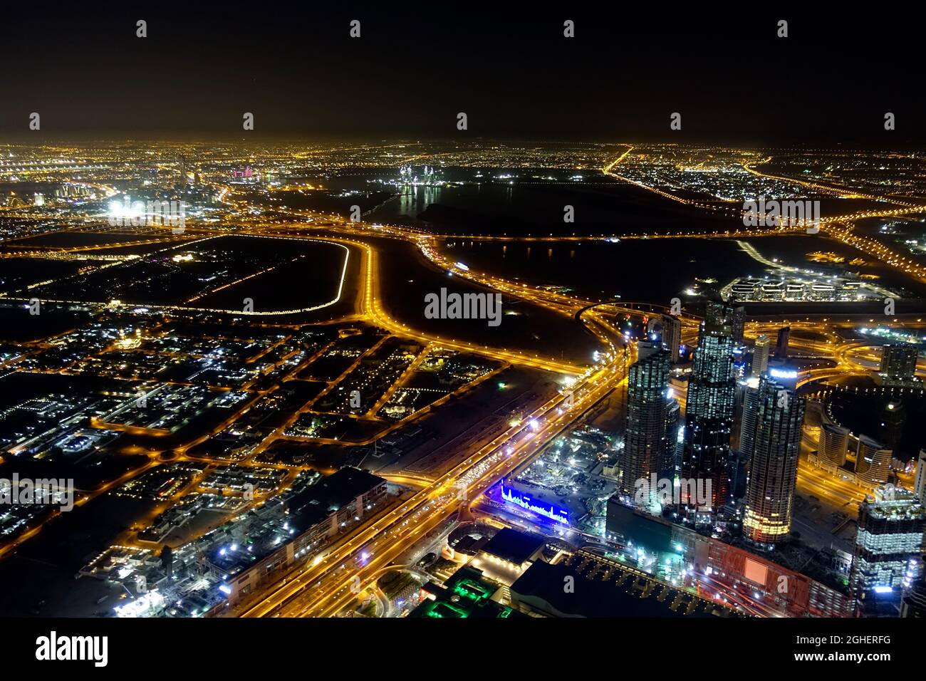 View of the Dubai Cityscape and Horizon at night from atop the Burj ...