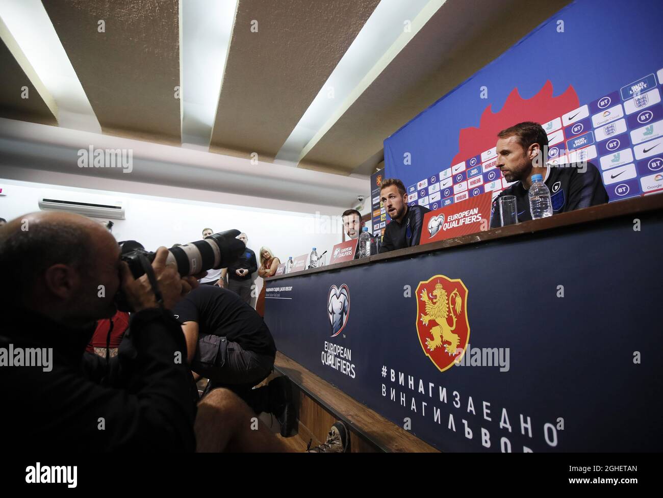 England's Gareth Southgate and Harry Kane speak during the England ...