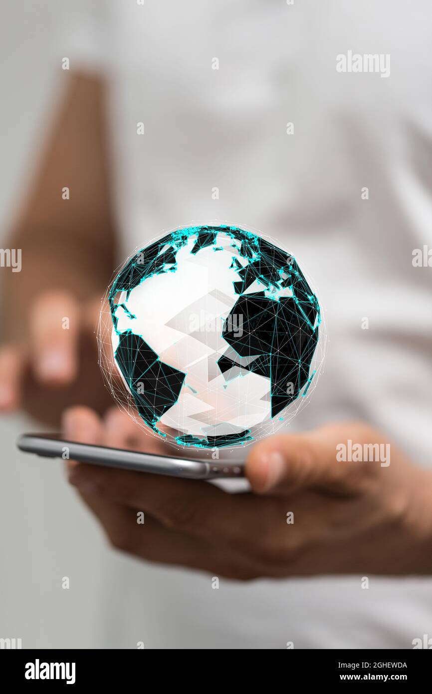 Closeup of a 3D rendered globe hologram hovering over a phone in man's ...