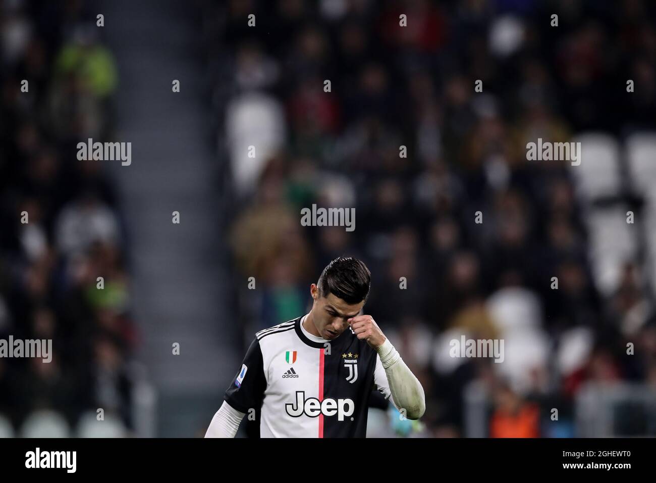Cristiano Ronaldo of Juventus bows his head during the Serie A match at ...