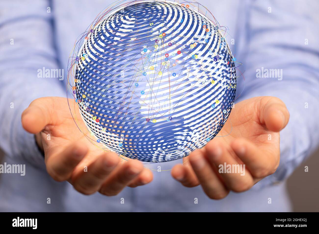 Closeup of a 3D rendered globe hologram hovering over man's hands Stock ...
