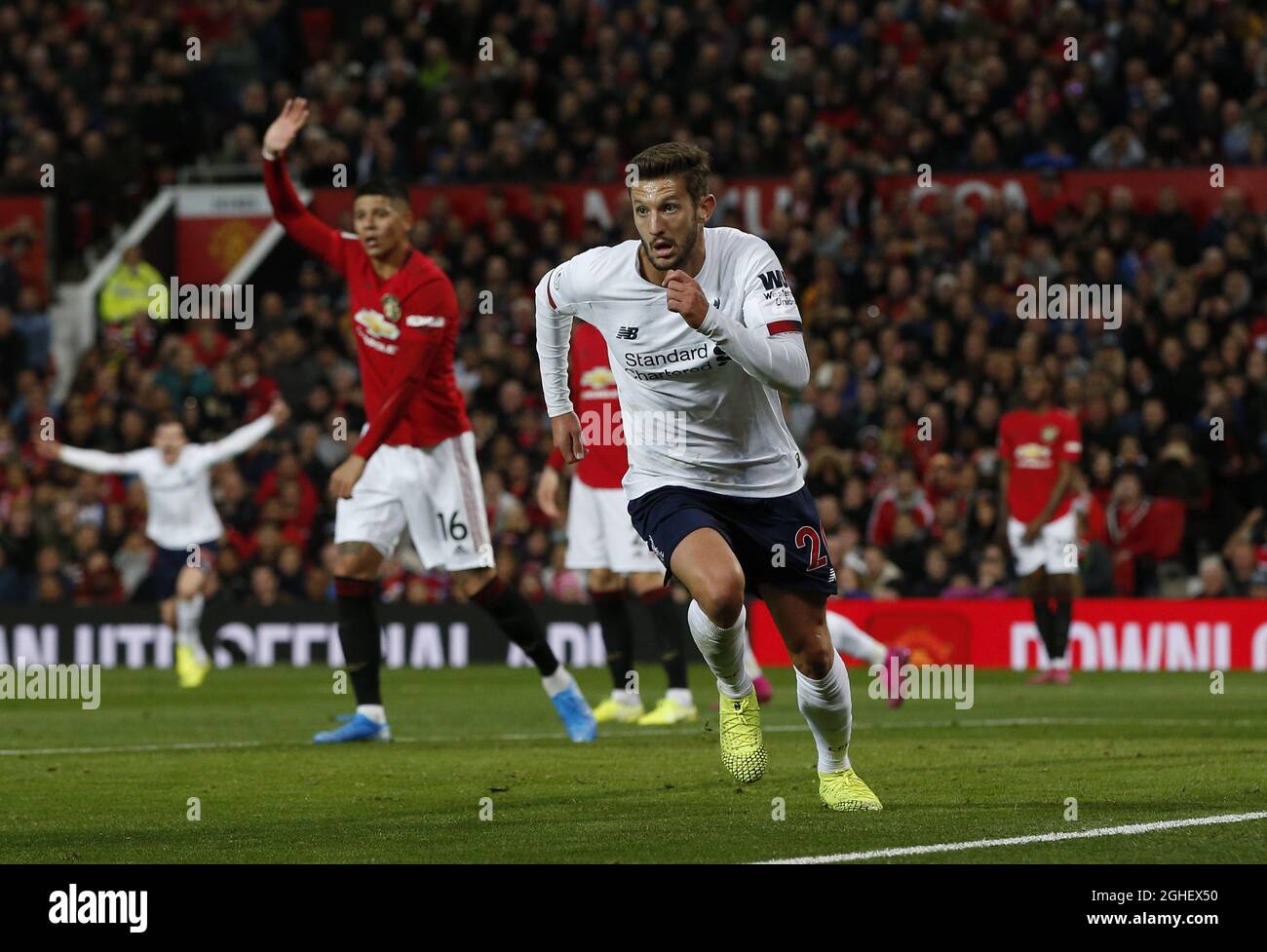 Adam Lallana of Liverpool celebrates scoring the equalising goal (1-1 ...