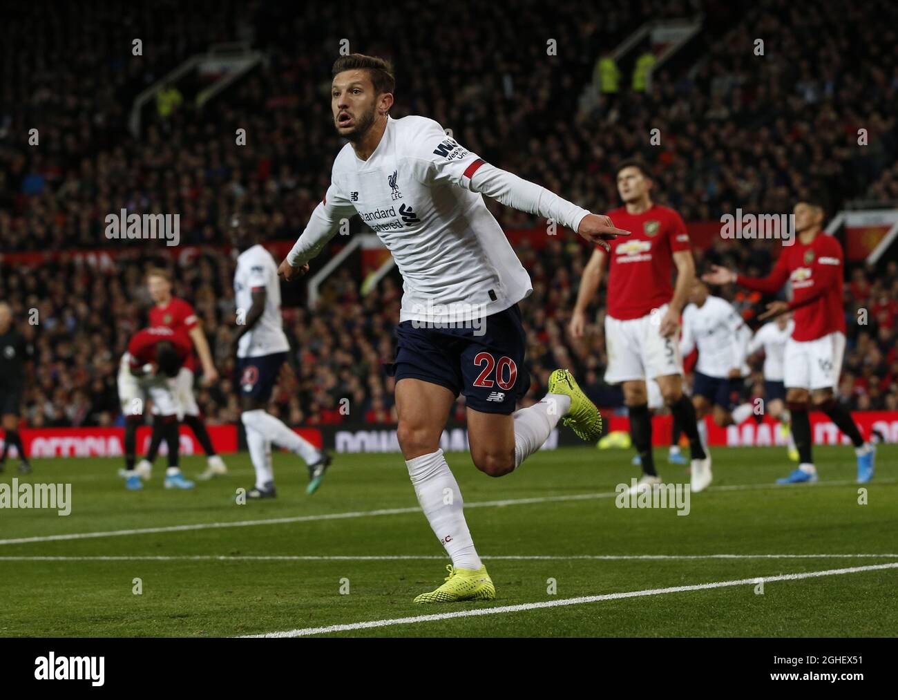 Adam Lallana of Liverpool celebrates scoring the equalising goal (1-1 ...
