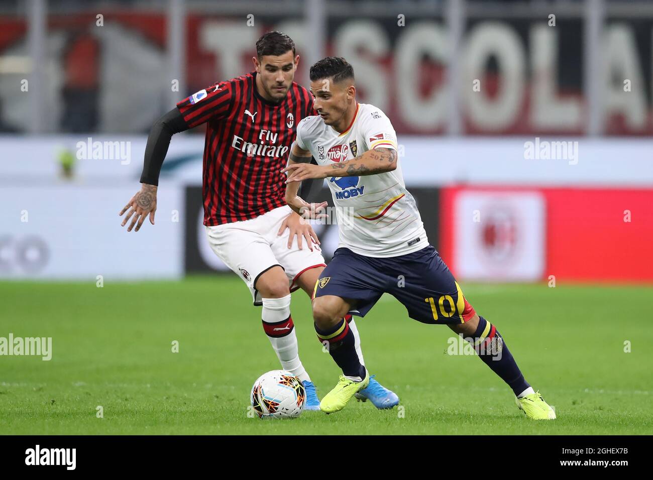 Filippo Falco of Lecce takes on Theo Hernandez of AC Milan during the ...