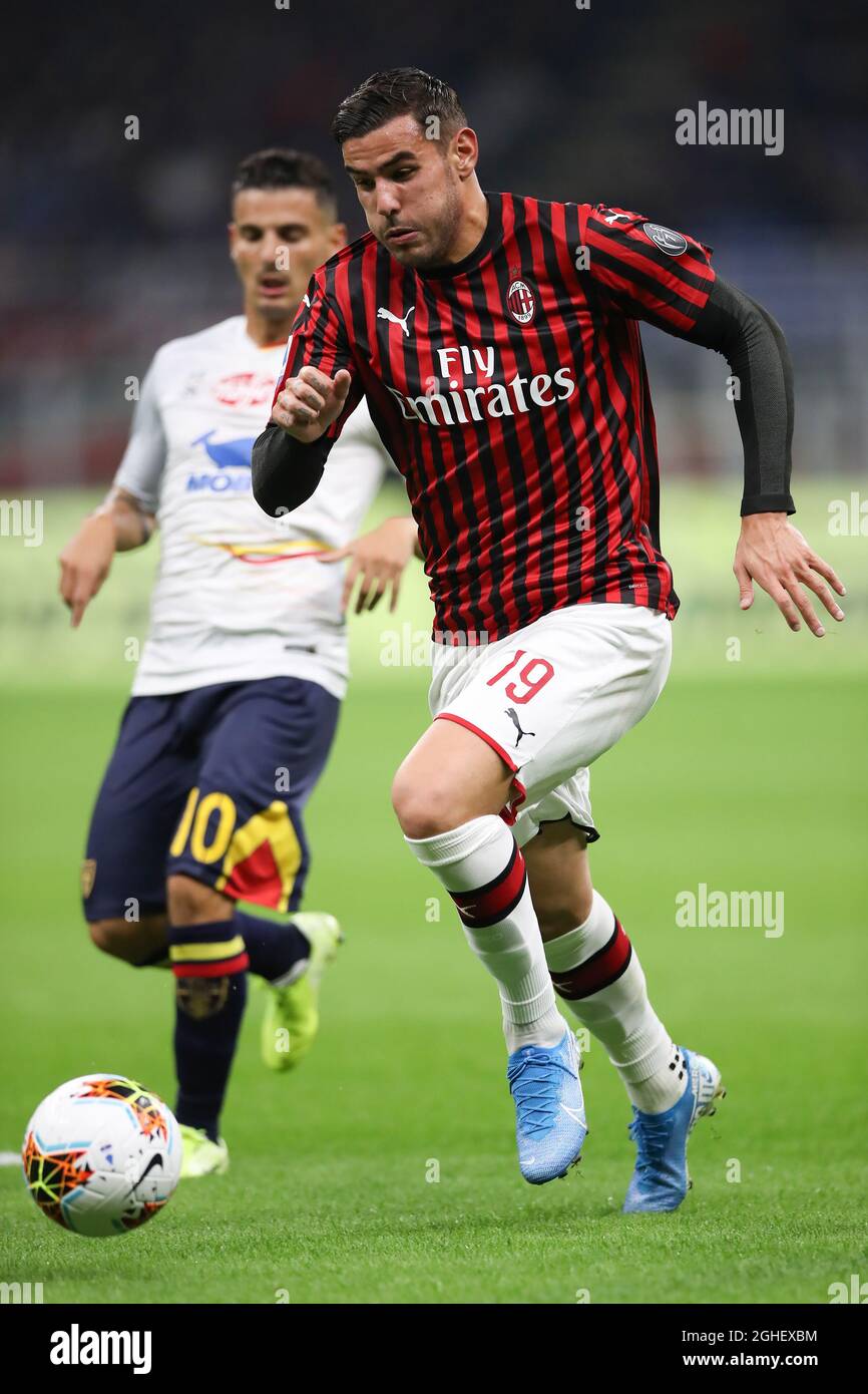 Theo Hernandez of AC Milan bursts past Filippo Falco of Lecce during ...
