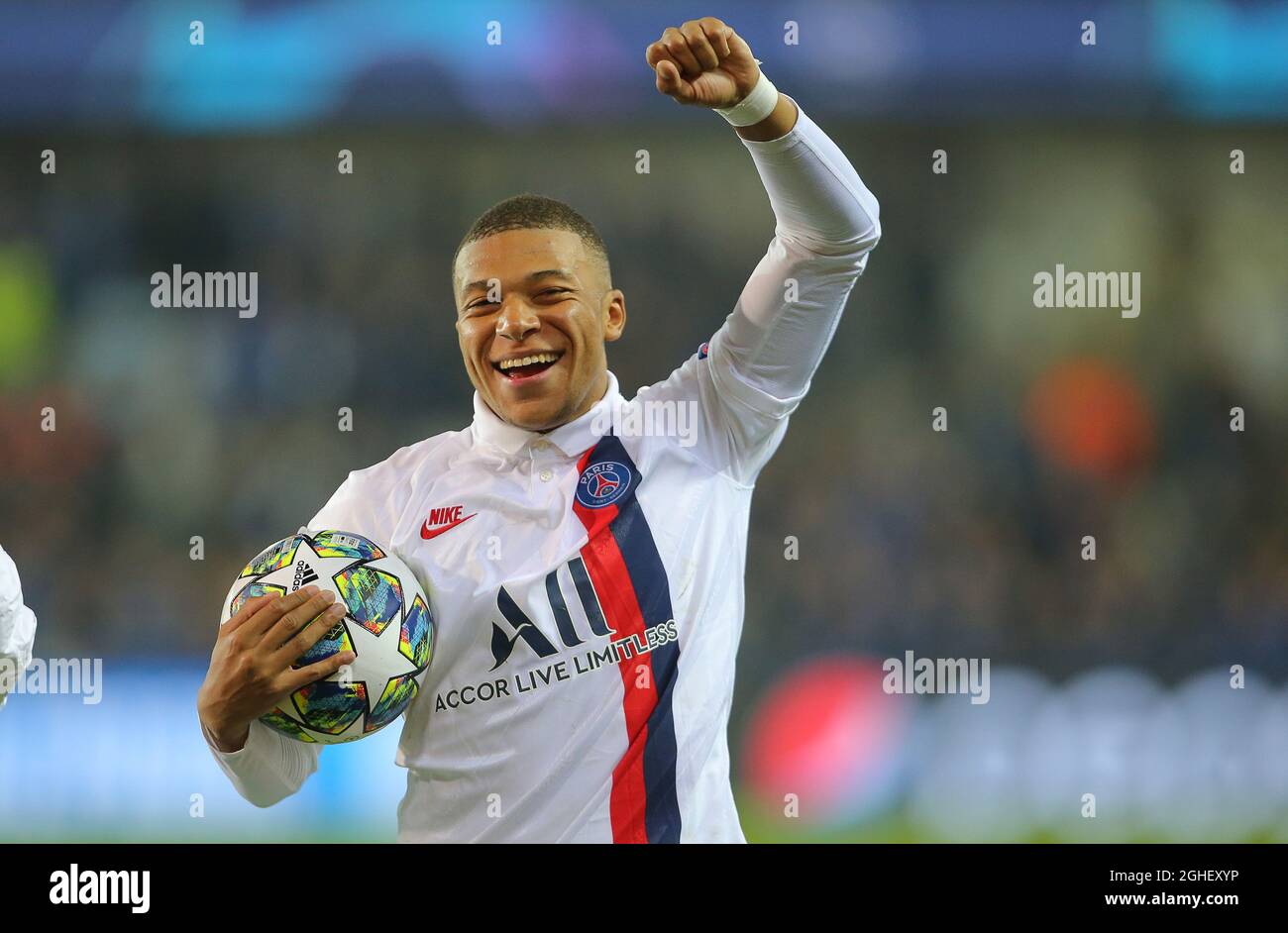 PSGÕs Kylian Mbappe celebrates with the match ball after scoring a hat ...