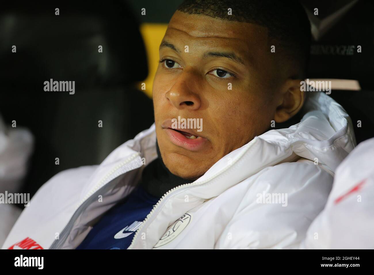 PSGÕs Kylian Mbappe pulls a face while sat on the substitutes bench ...