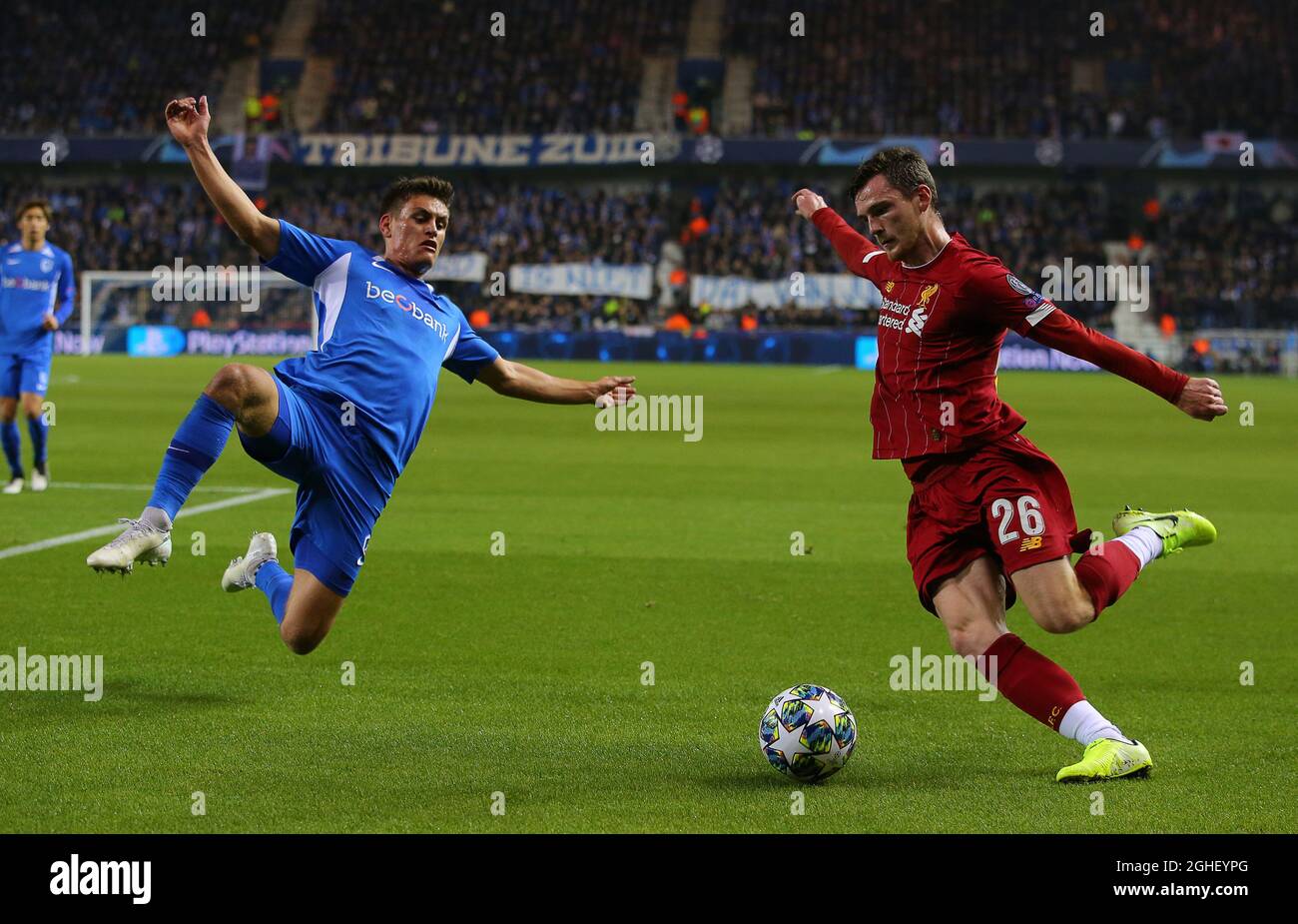 GenkÕs Joakim Maehle blocks a cross from LiverpoolÕs Andrew Robertson ...