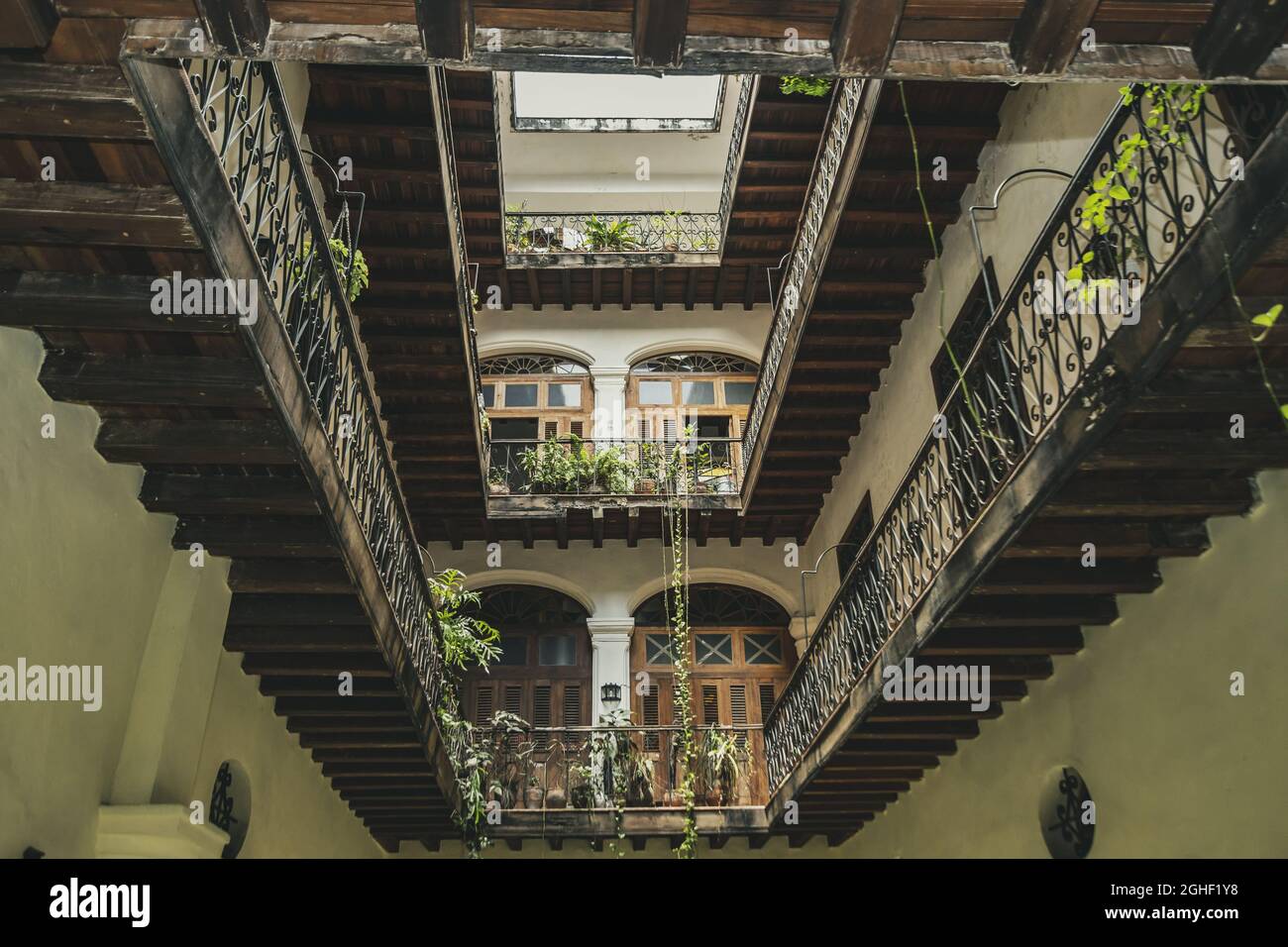 Low angle shot of interior balconies and staircase with decorative ...