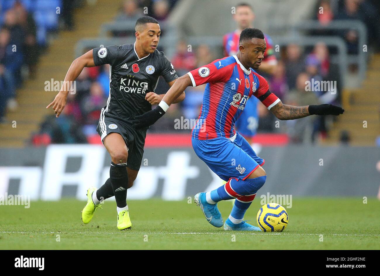 Crystal PalaceÕs Jordan Ayew is challenged by LeicesterÕs Youri ...
