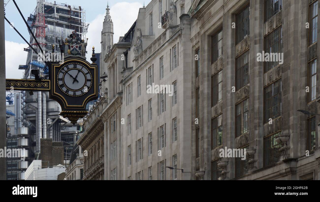 old clock on the wall and city buildings, London, England, UK, United ...