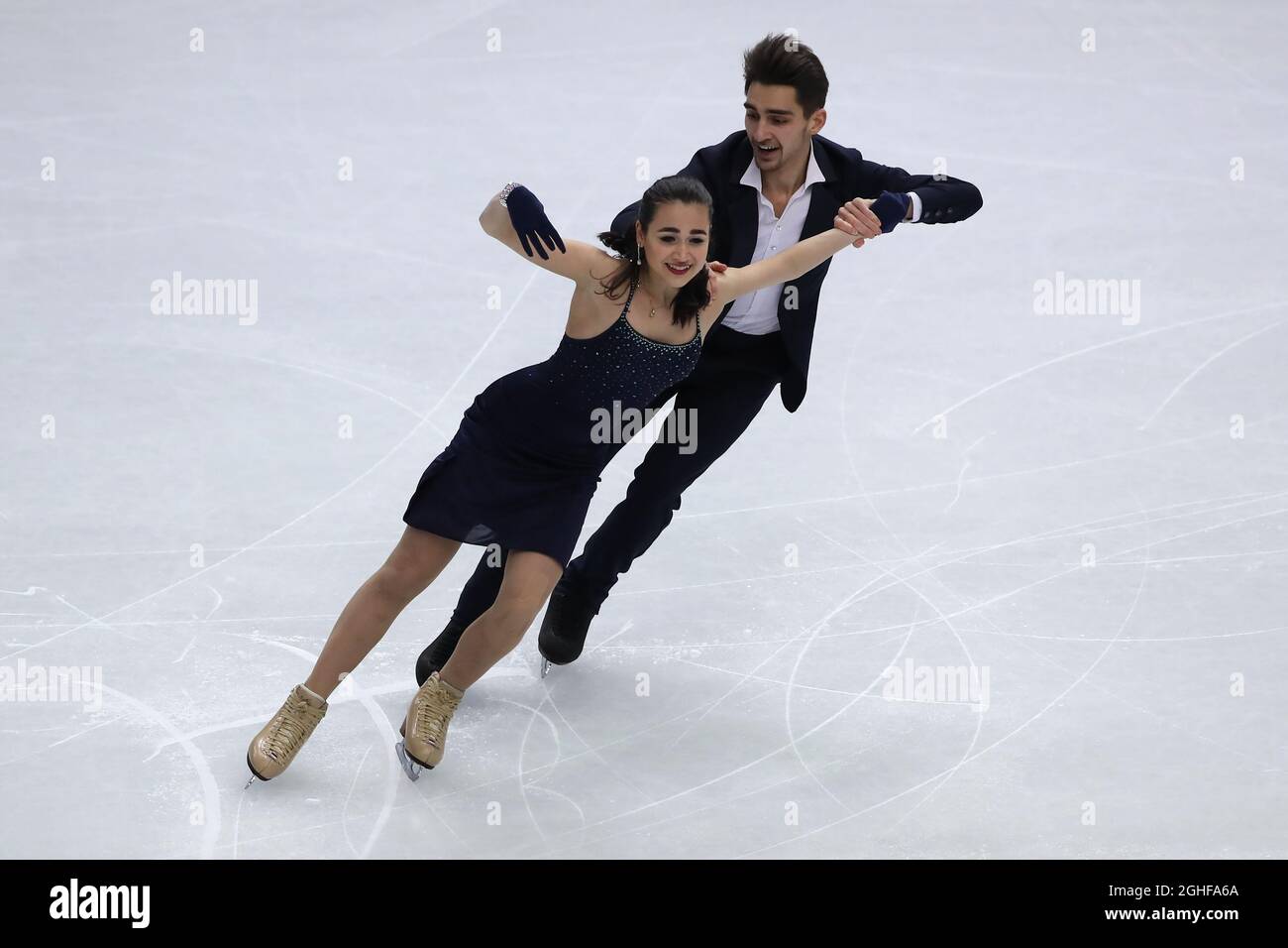 Elizaveta Khudaiberdieva and Andrey Filatov of Russia perform at ...