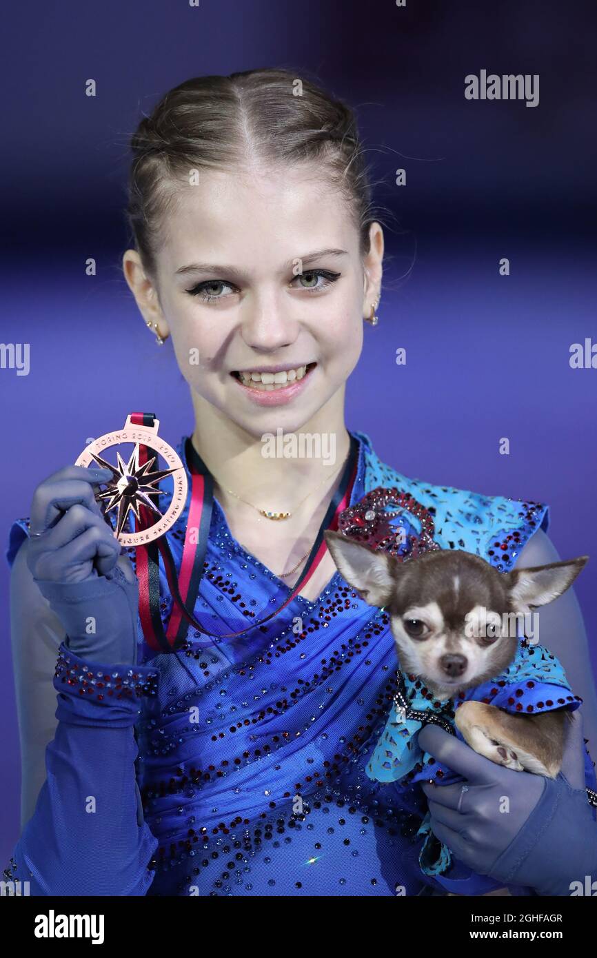 Alexandra Trusova shows off her Ladies Bronze Medal whilst holing her ...