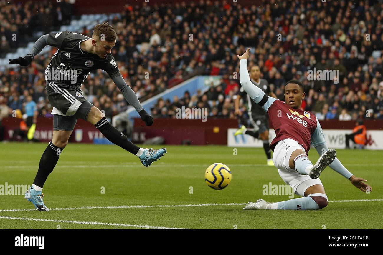 James Maddison of Leicester City shoots past Ezri Konsa Ngoyo of Aston ...
