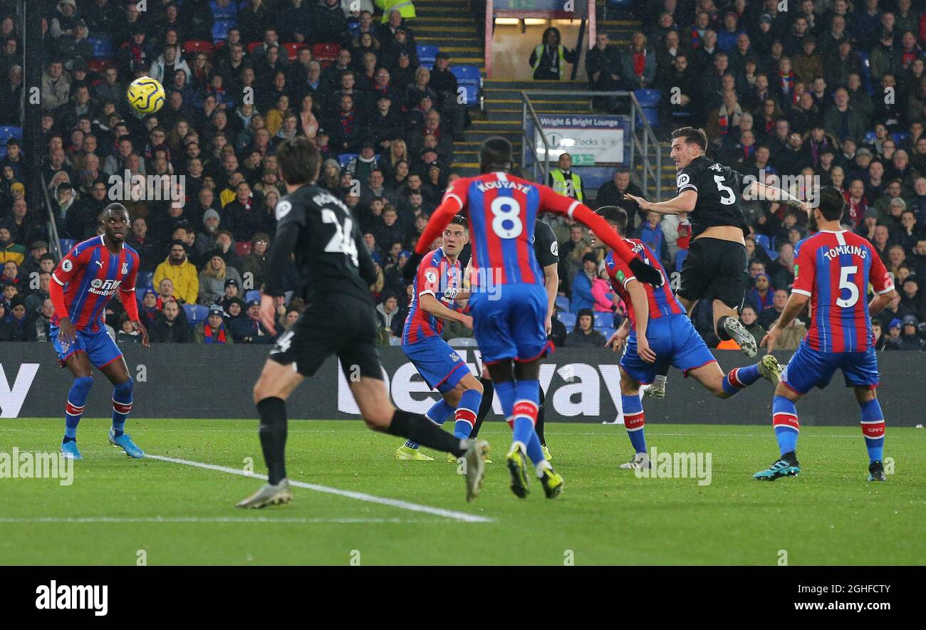 BrightonÕs Lewis Dunk heads the ball towards goal during the Premier ...