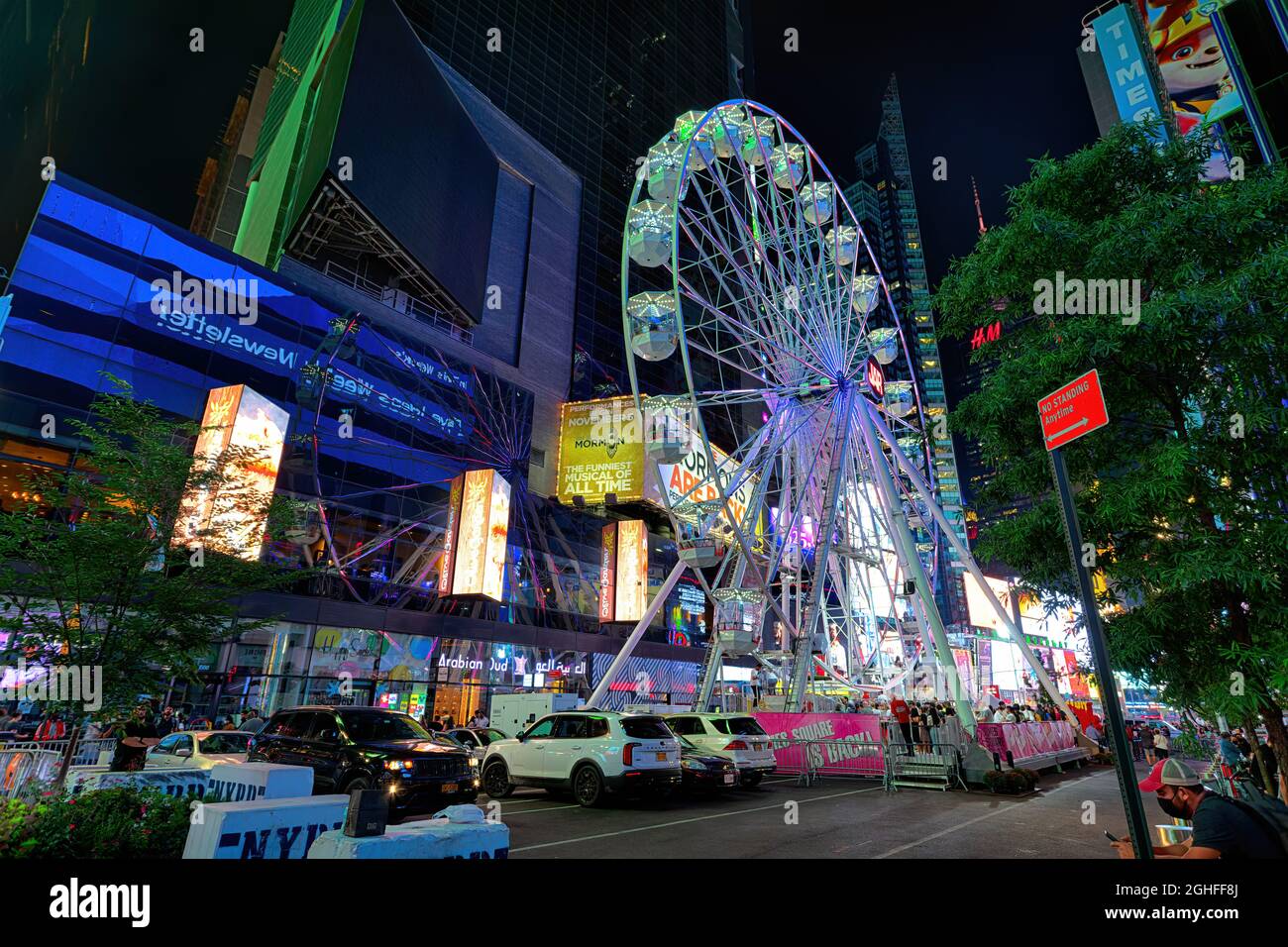 Times Square Wheel, a 110-foot-tall amusement, is a temporary tourist ...