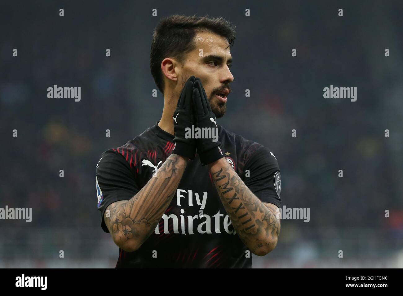 Suso of AC Milan reacts during the Serie A match at Giuseppe Meazza ...