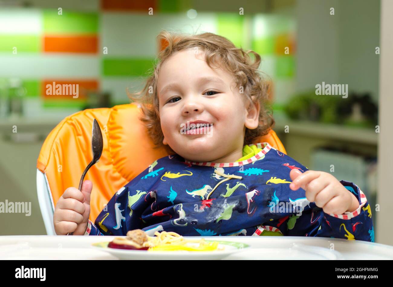 little boy eating at home Stock Photo - Alamy
