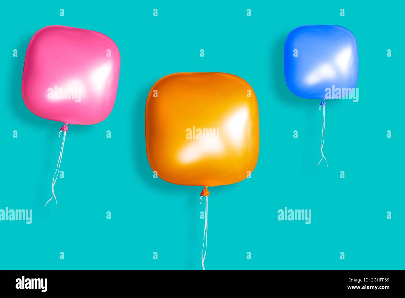 Square shaped balloons-kids party concept Stock Photo - Alamy
