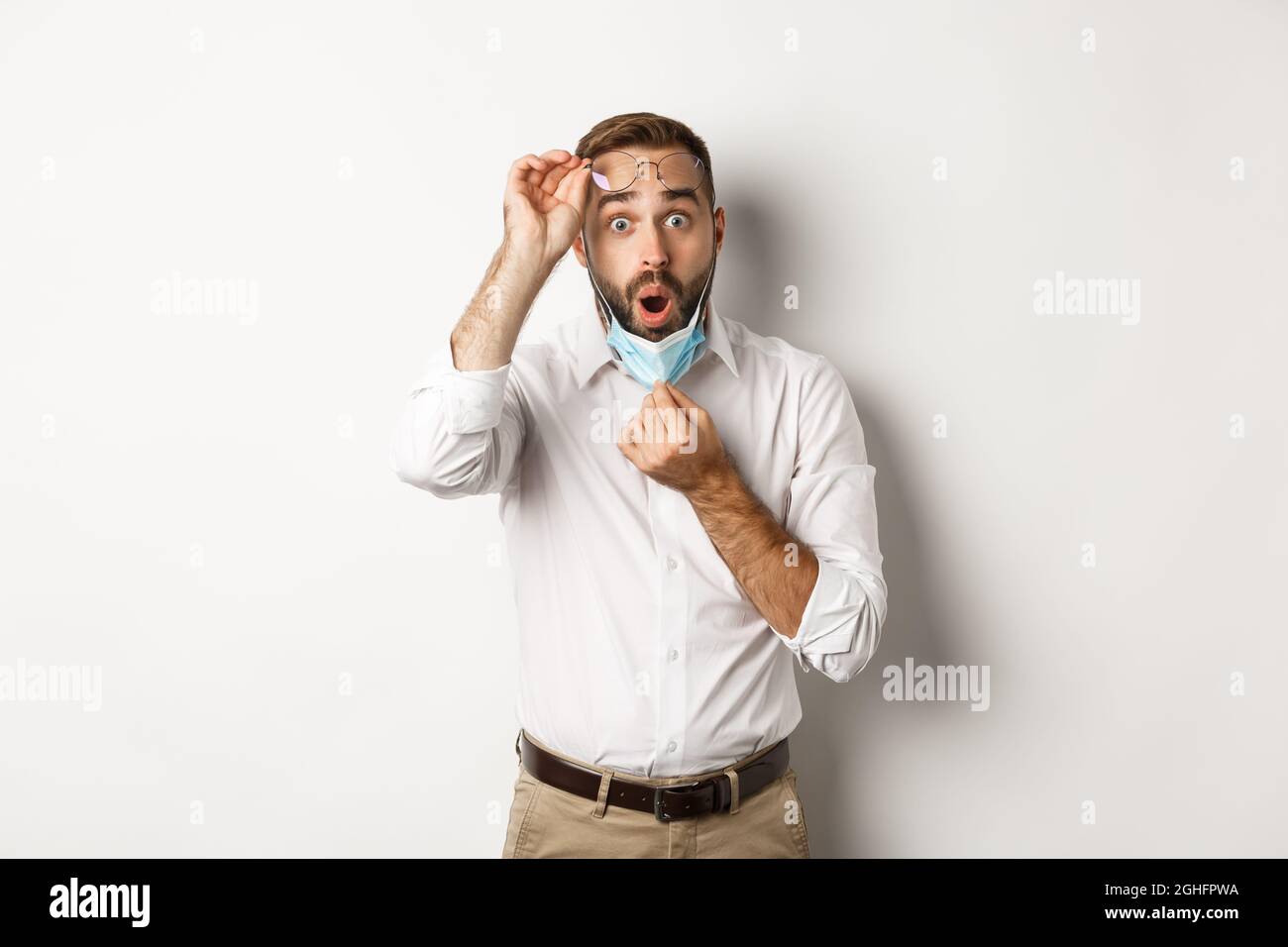 Covid-19, social distancing and quarantine concept. Surprised man take ...