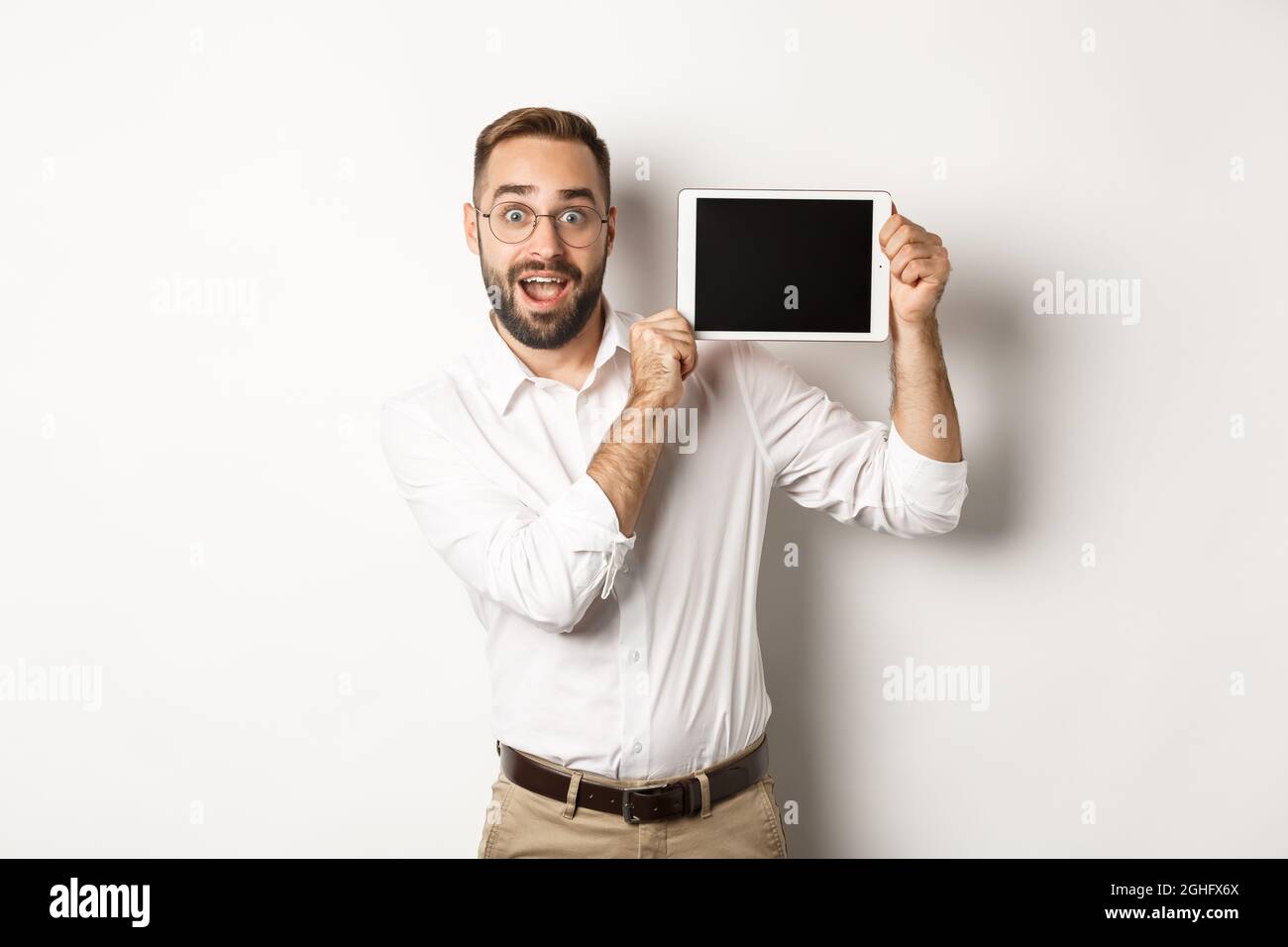 Shopping and technology. Handsome man showing digital tablet screen ...
