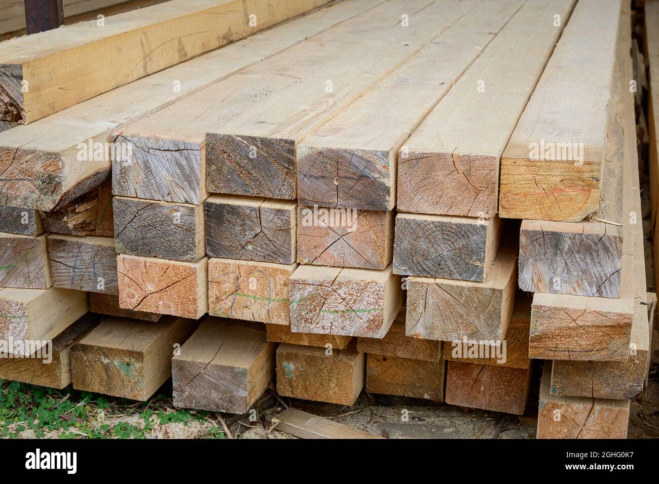 Piles of wooden planks at the sawmill for the manufacture of cladding ...