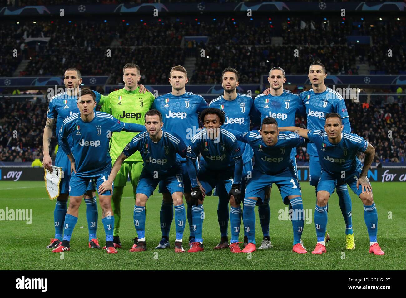 The Juventus starting eleven line up for a team photo before kick off ...