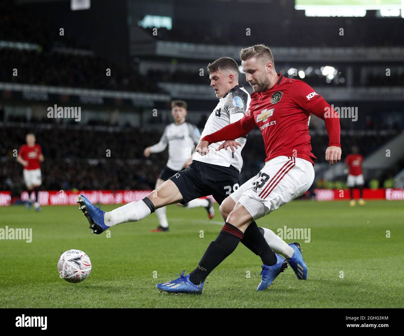 Luke Shaw of Manchester United runs past Jason Knight of Derby County ...
