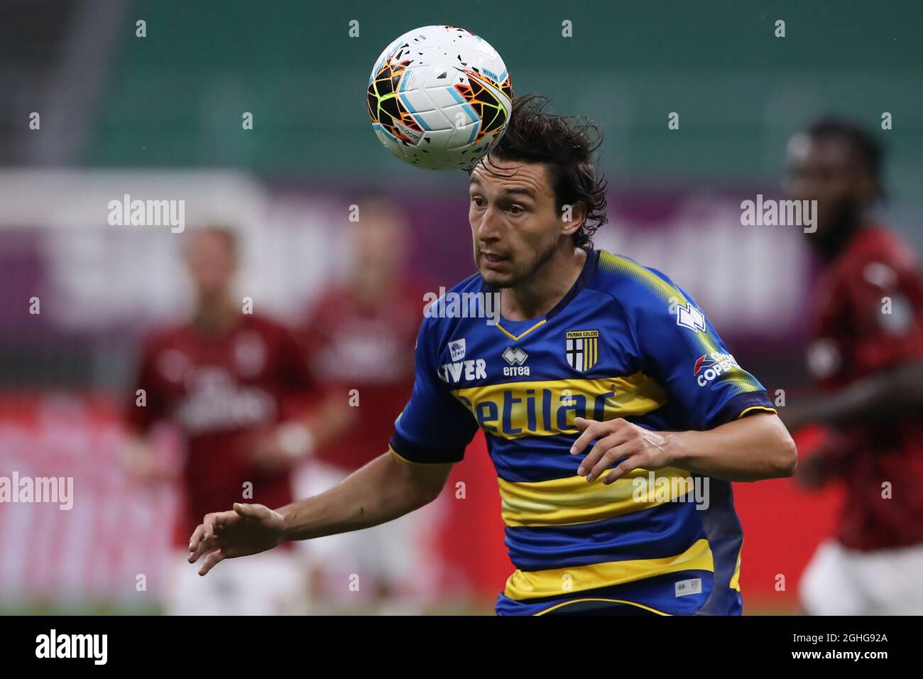 Italian defender Matteo Darmian of Parma Calcio heads the ball back to ...