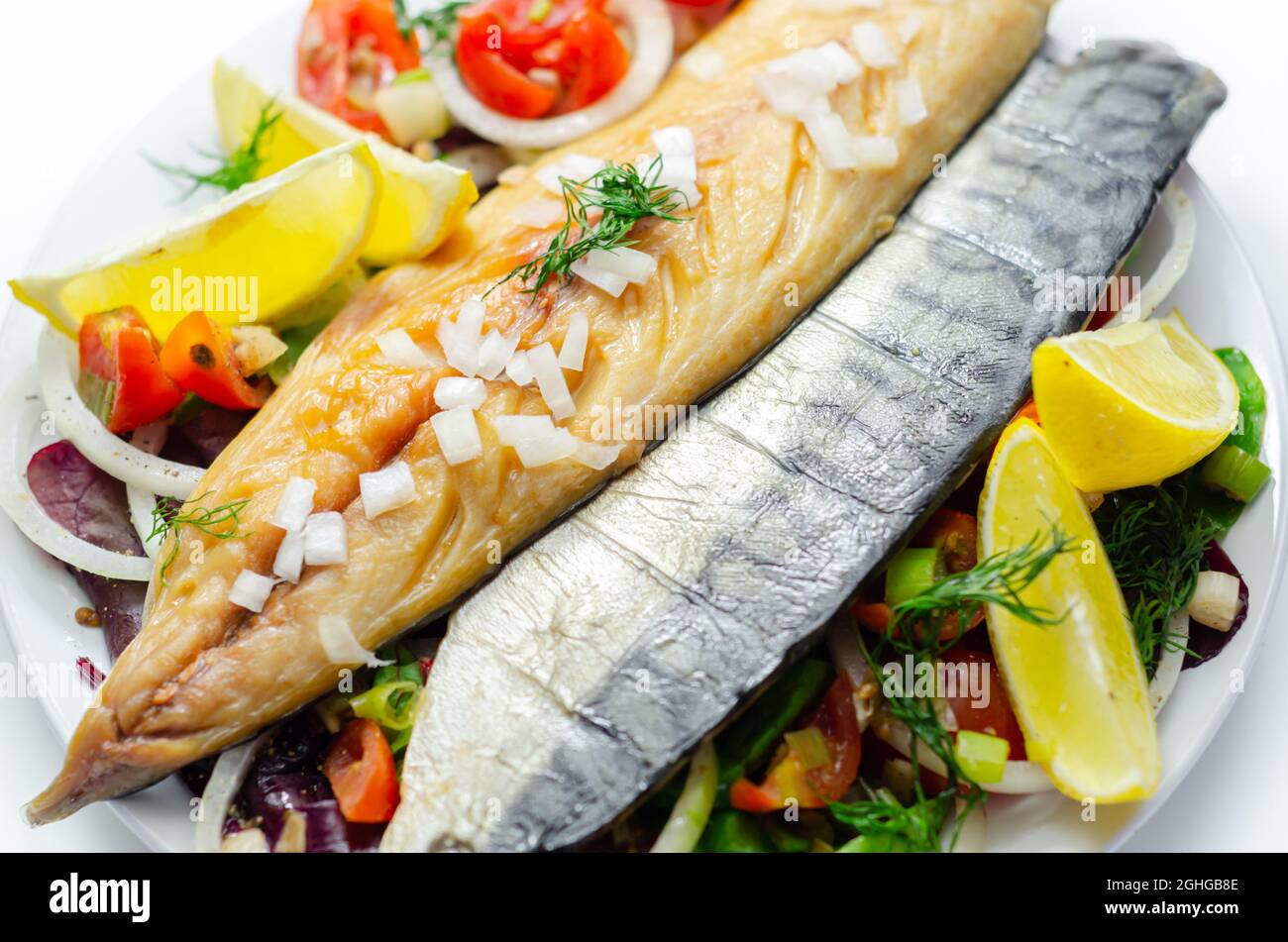 Hot smoked scottish mackerel fillets with onions, tomato and salad ...